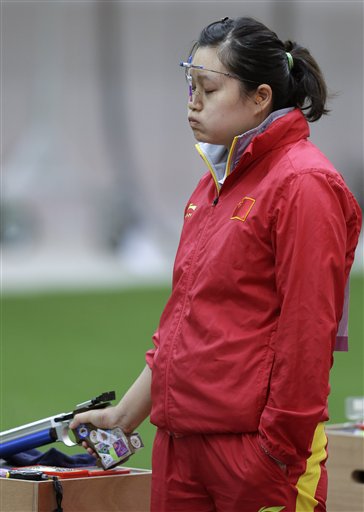 China's Guo retains Olympic 10m air pistol title | Inquirer Sports
