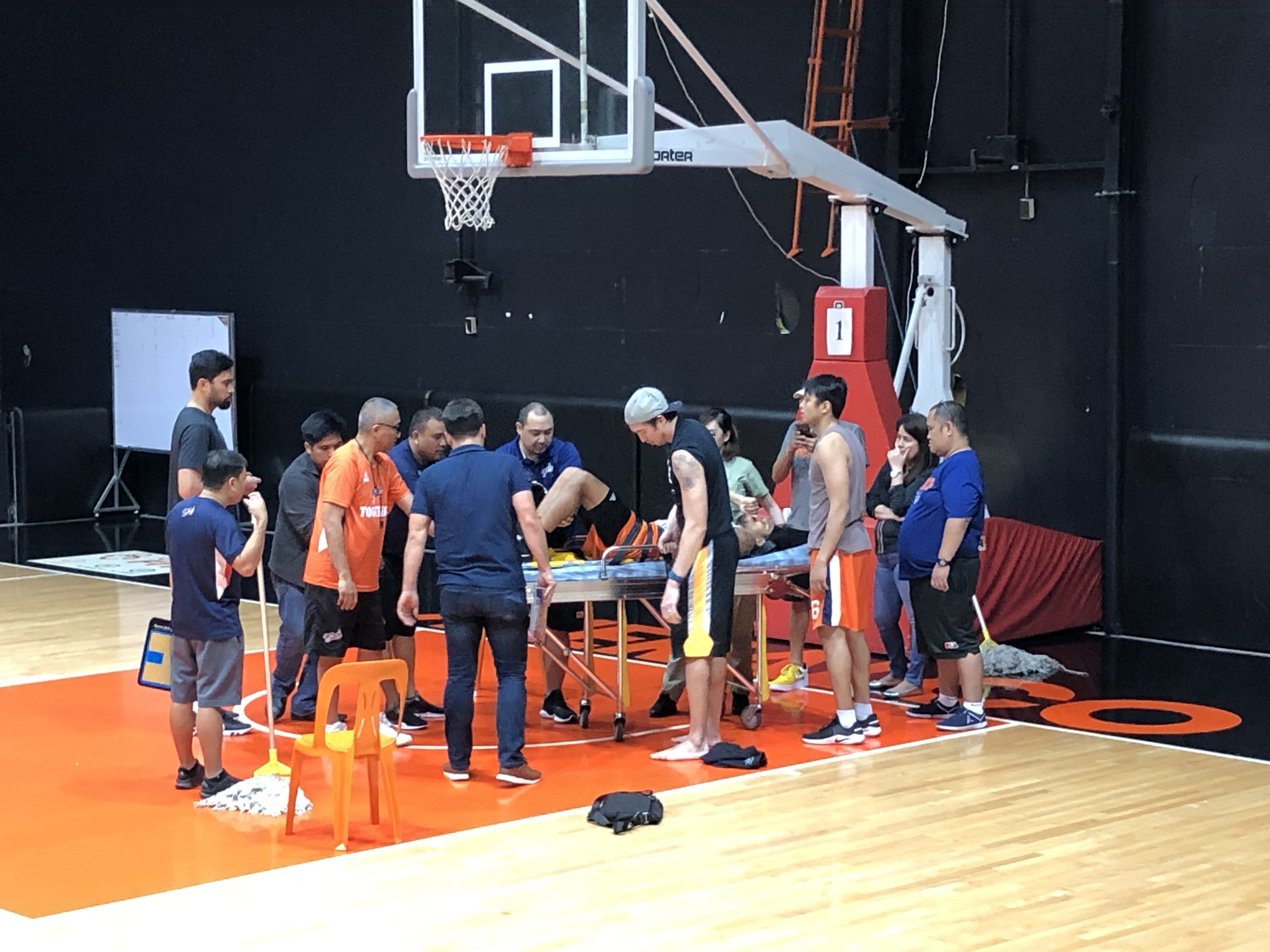 Trevis Jackson leaves on a stretcher after scary fall at Meralco ...