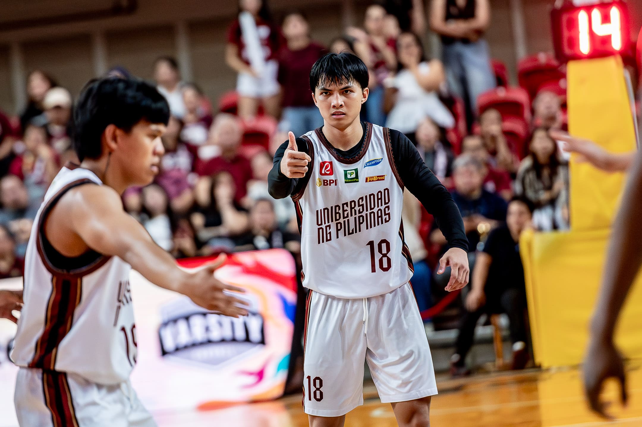 Harold Alarcon powers through for UP Fighting Maroons