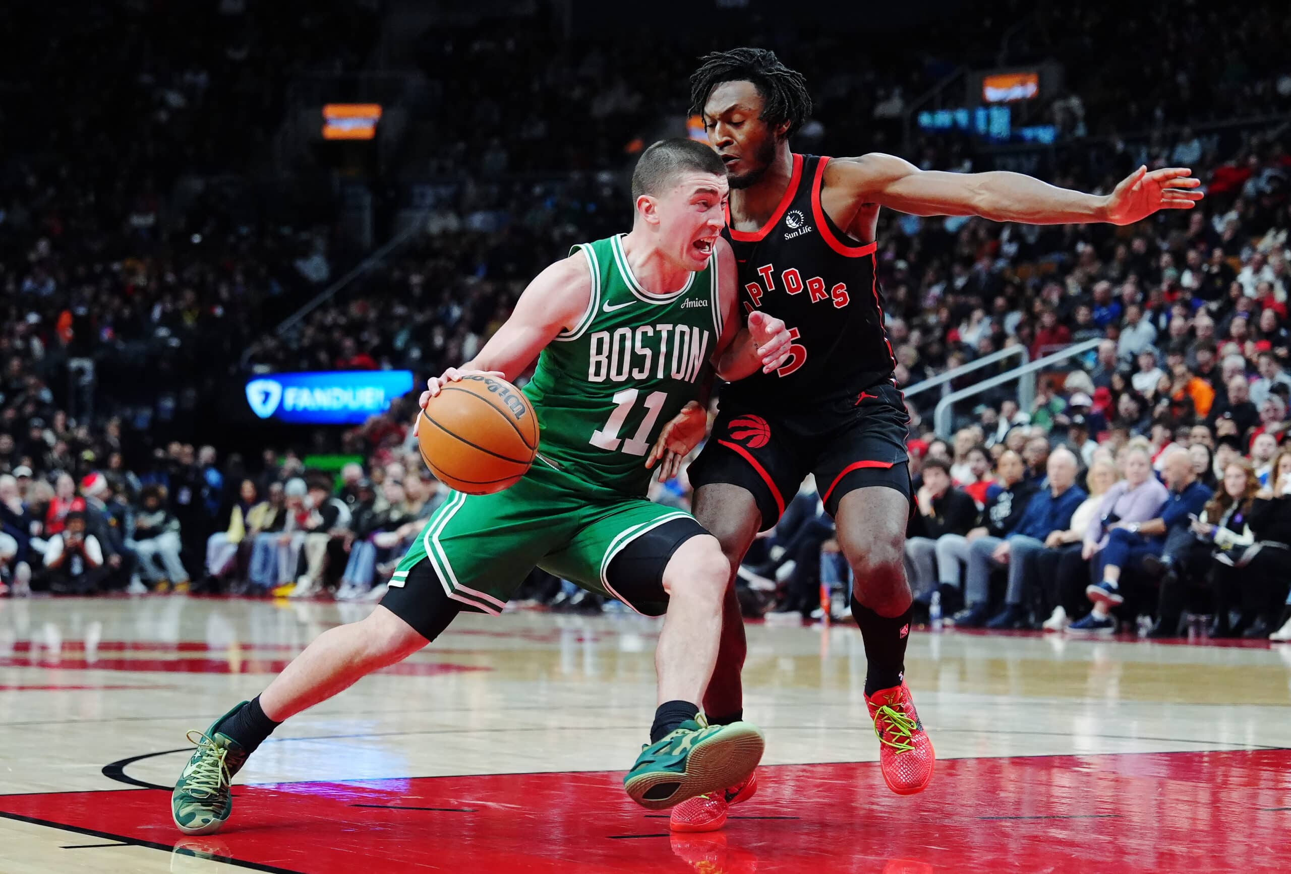 NBA: Short-handed Celtics turn back slumping Raptors