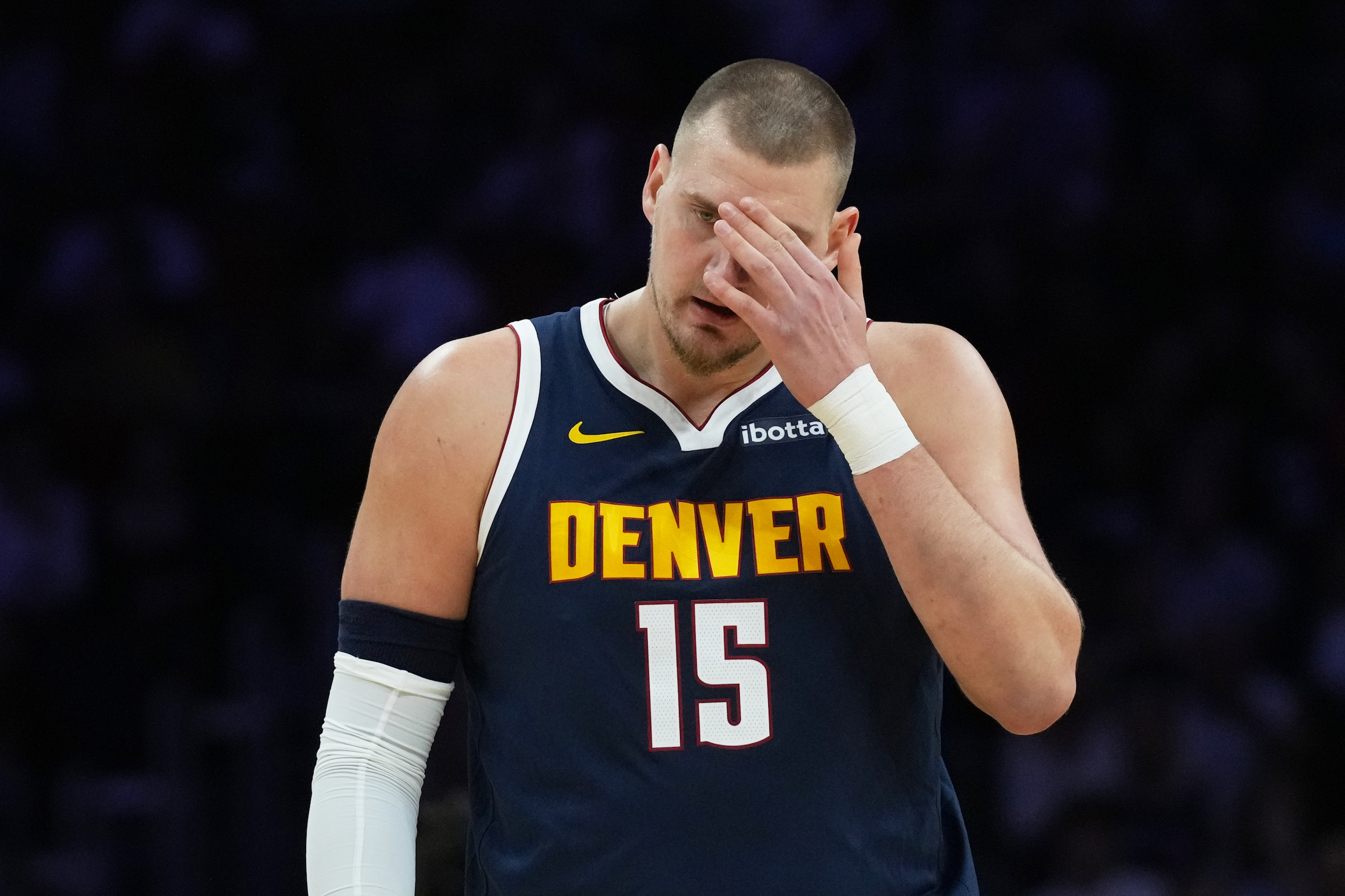 NBA: Nikola Jokic hurts left knee vs Heat, limps off court